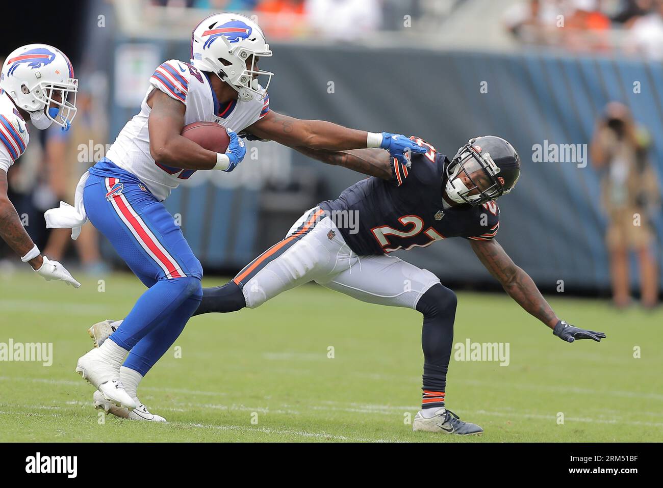 Buffalo Bills running back Darrynton Evans (37) stiff arms Chicago ...