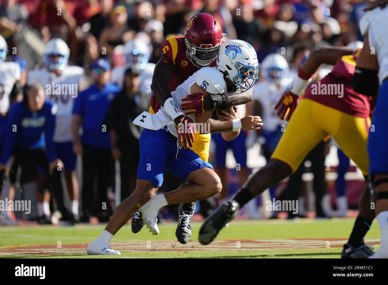 San Jose State quarterback Chevan Cordeiro (2) is tackled by Southern ...