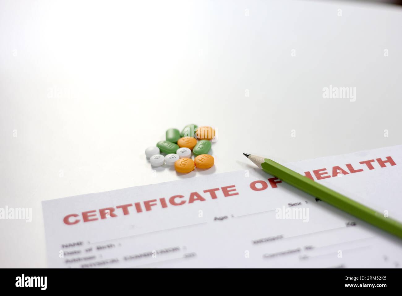 Health checkup exam paper chart and pills, medical privacy concept ...