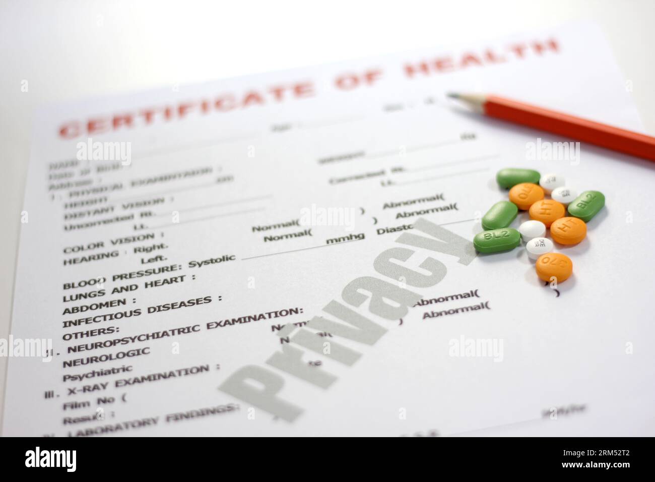 Health checkup exam paper chart and pills, medical privacy concept ...