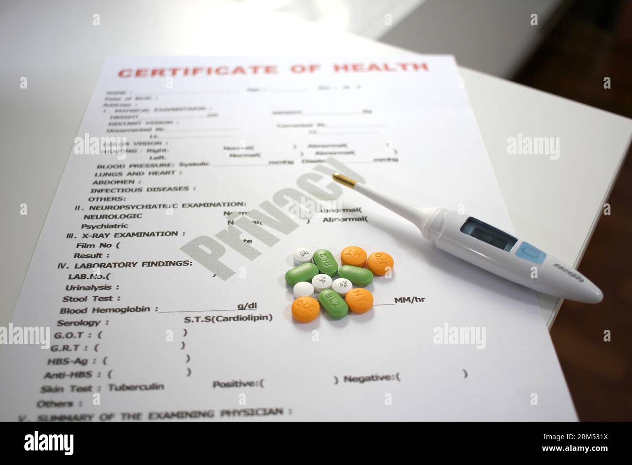 Health checkup exam paper chart and pills, medical privacy concept ...