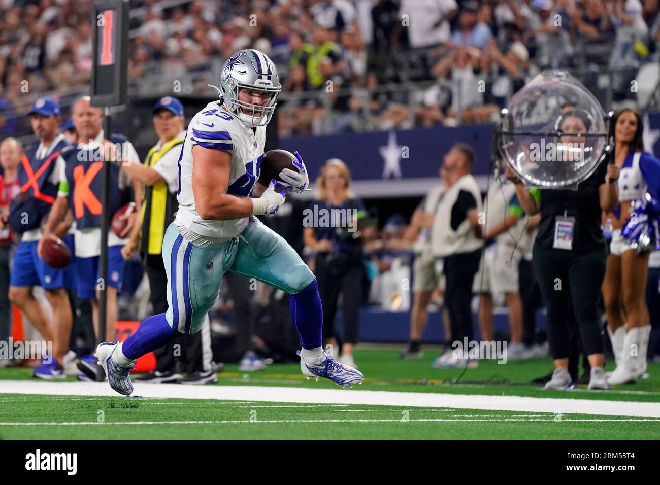 Dallas Cowboys running back Hunter Luepke sprints to the end zone ...