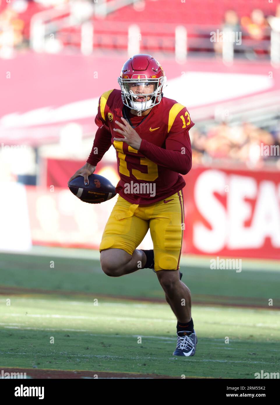 August 26, 2023 USC Trojans quarterback Caleb Williams #13 scrambles ...