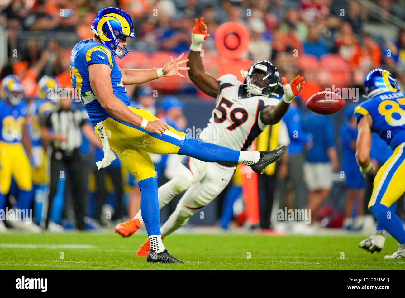 Los Angeles Rams punter Ethan Evans kicks past Denver Broncos ...