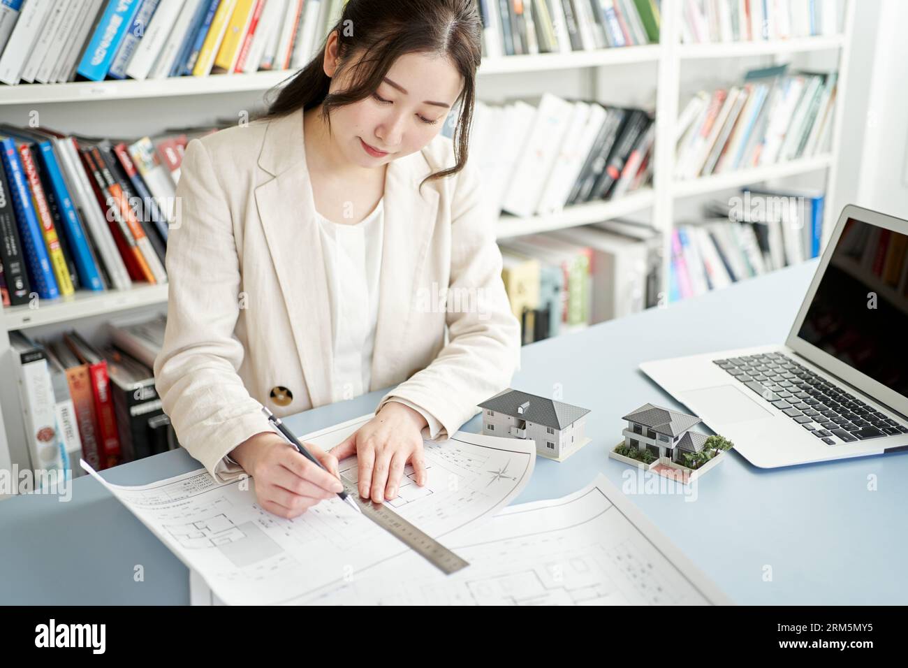 Woman architect designing layout building hi-res stock photography and ...