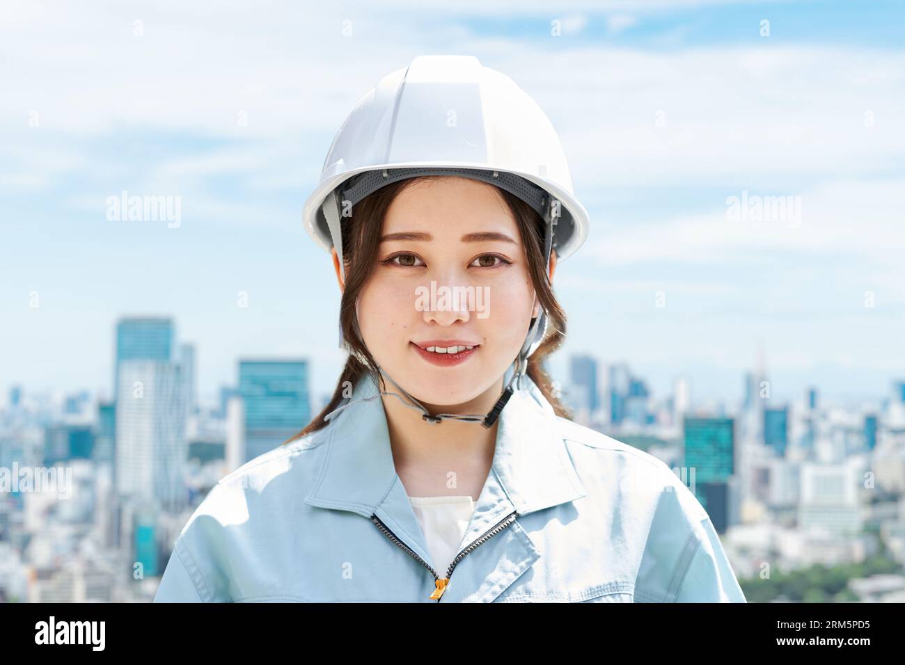 Construction workers against backdrop hi-res stock photography and ...
