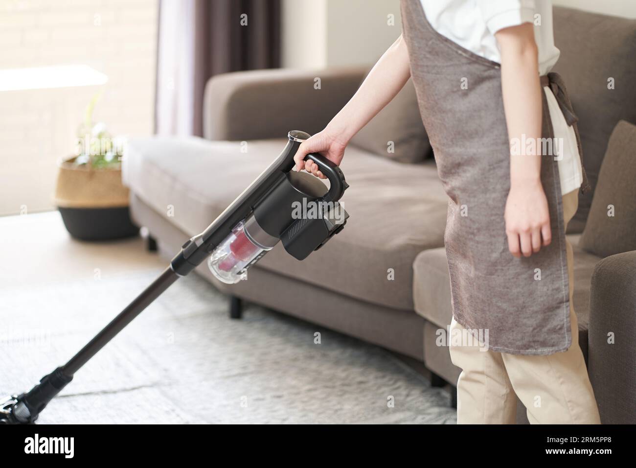 Close up woman vacuuming hi-res stock photography and images - Alamy