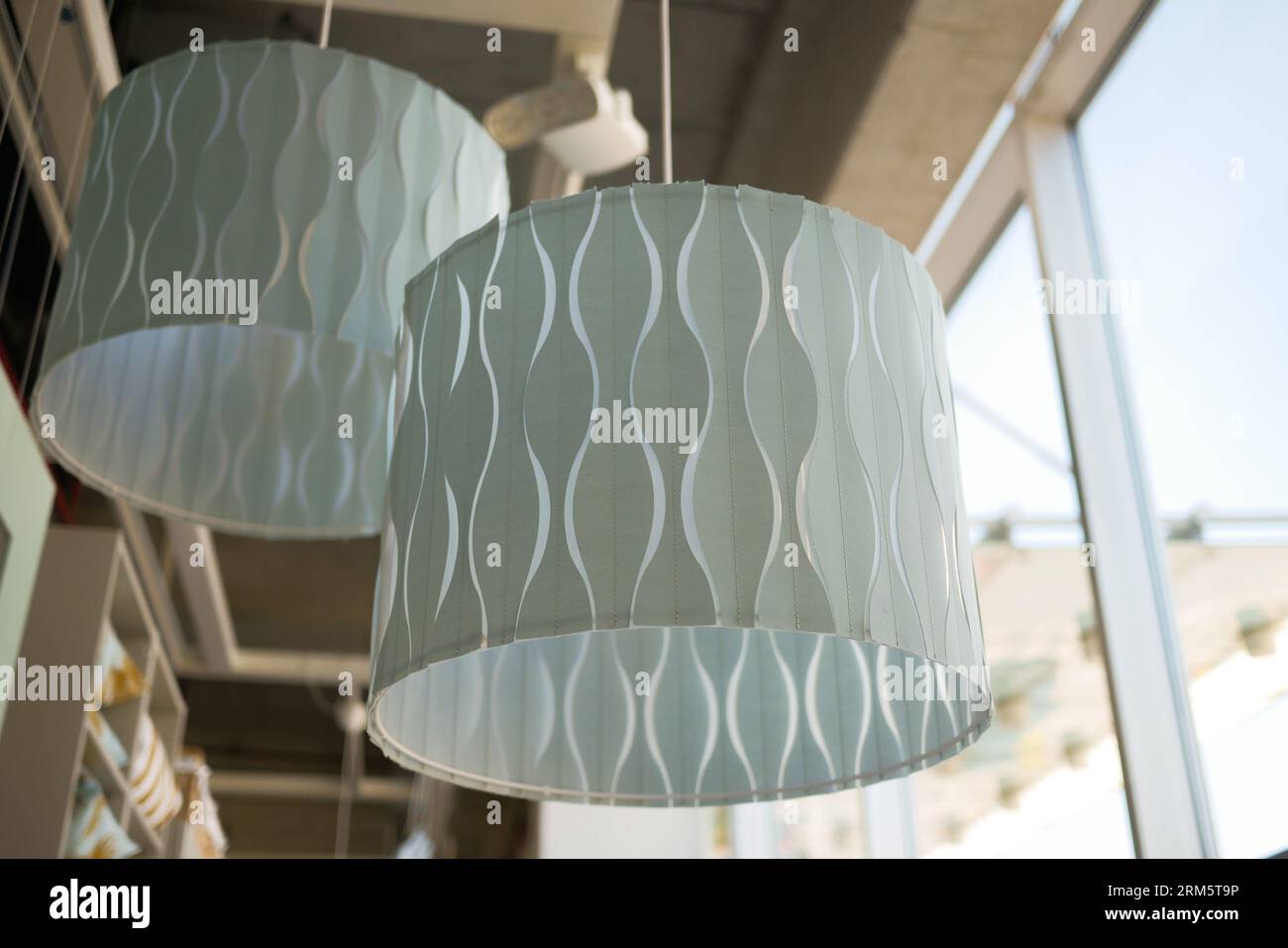 gray ceiling lamp hanging in a room Stock Photo - Alamy