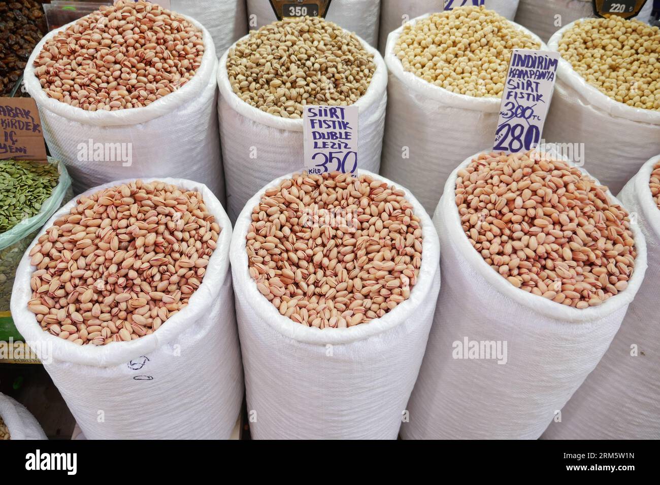 pistachios nuts selling at the market Stock Photo - Alamy