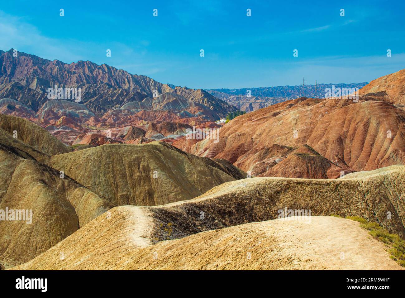 The way through the rainbow Colorful rock formations in the Zhangye ...