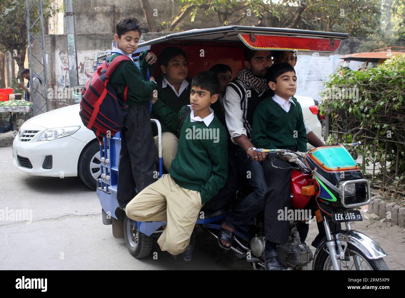 Pakistani students ride on hi-res stock photography and images - Alamy