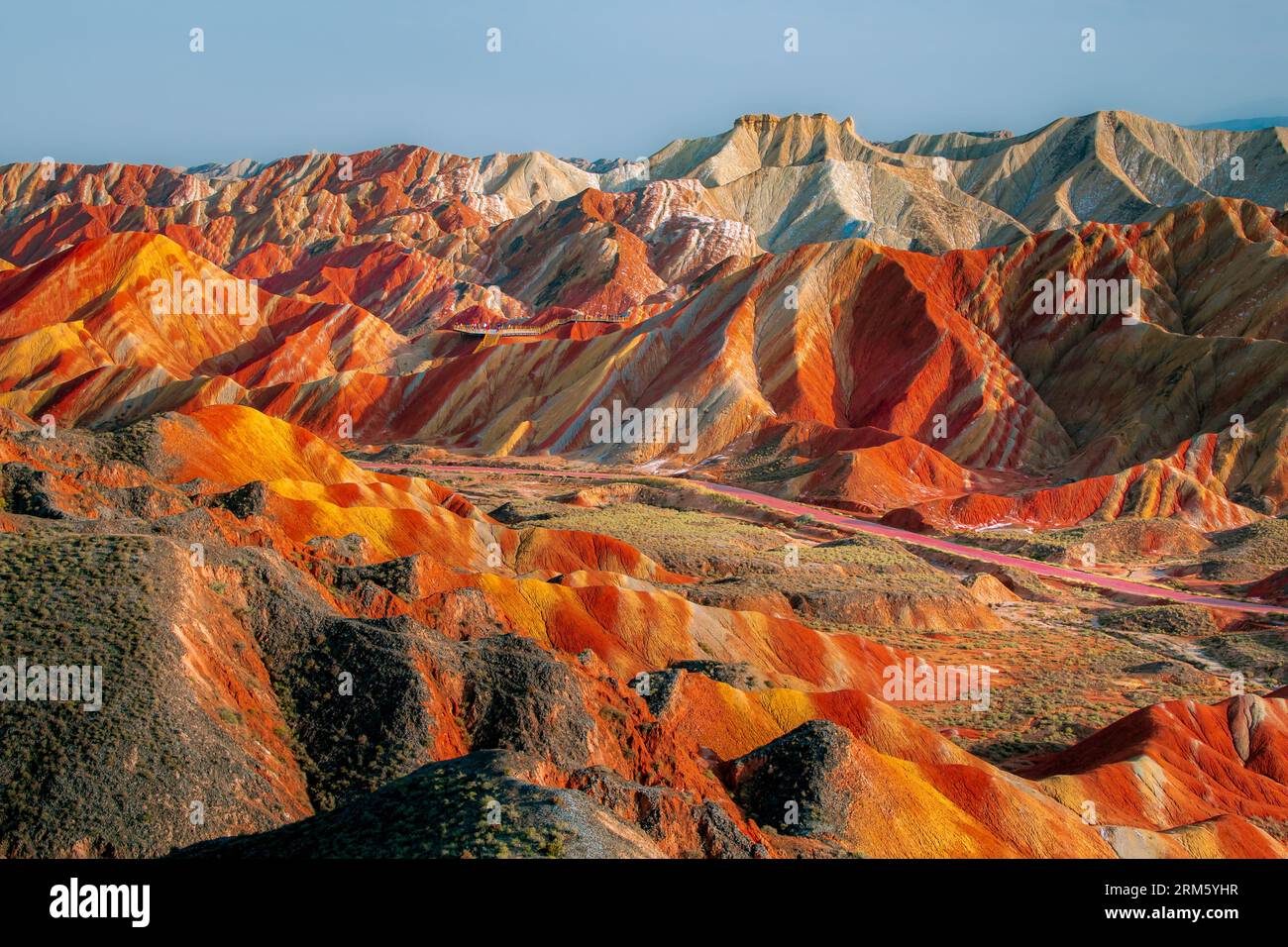 The way through the rainbow Colorful rock formations in the Zhangye ...