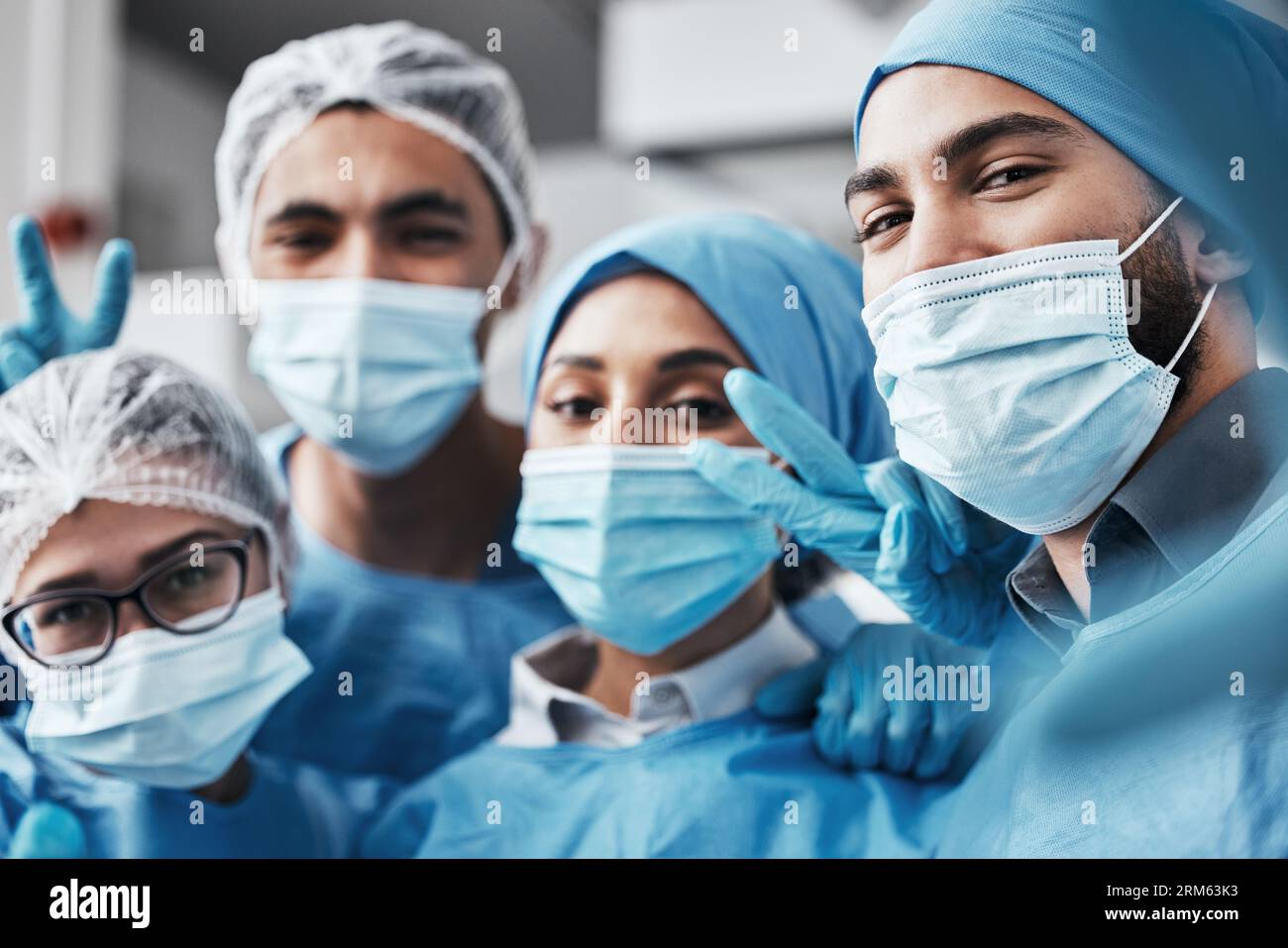 Healthcare, teamwork and surgery, selfie in operating room in medical ...