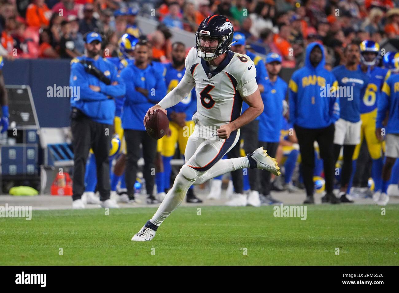 Denver Broncos quarterback Ben DiNucci (6) runs against the Los Angeles ...