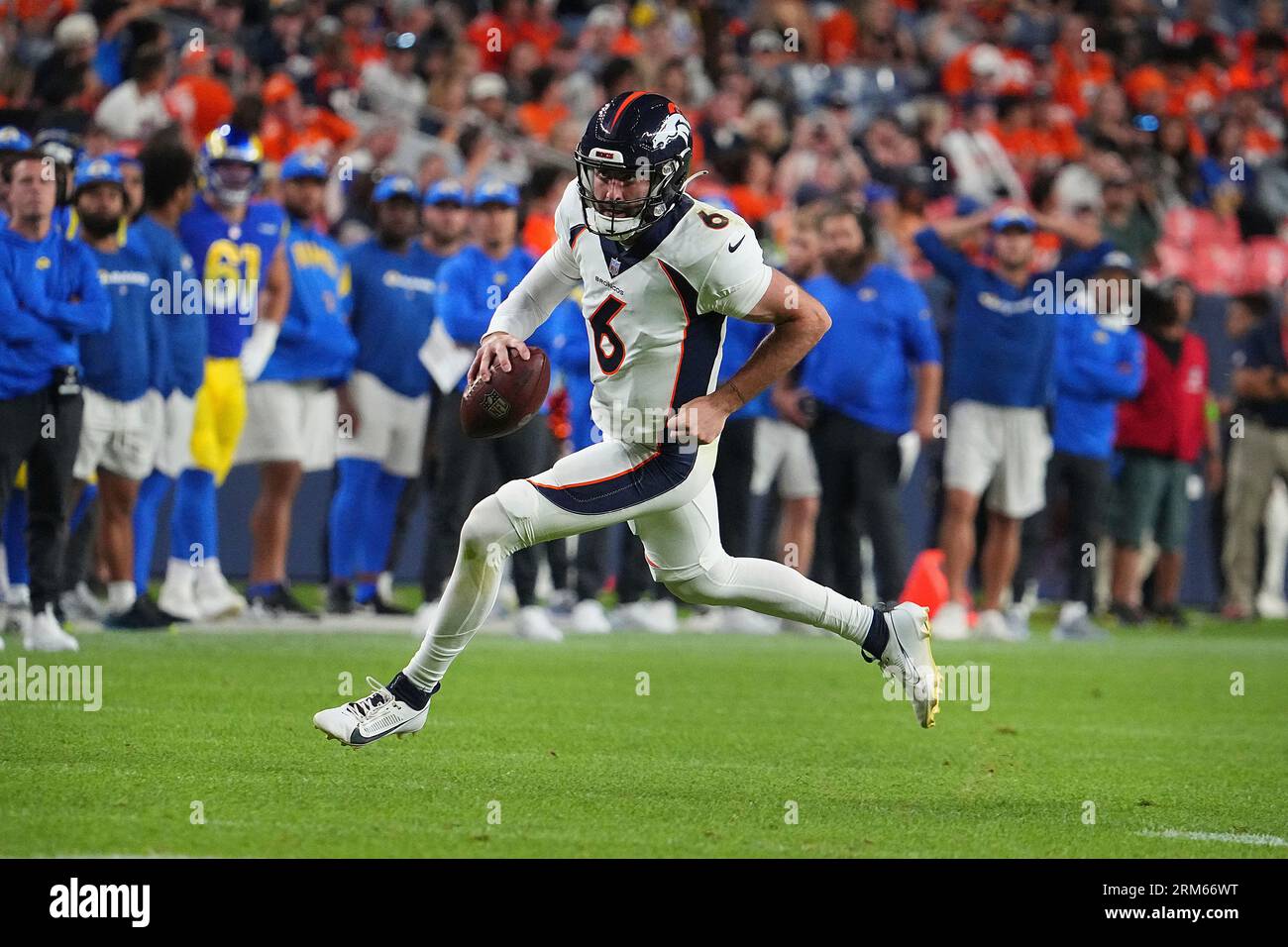 Denver Broncos quarterback Ben DiNucci (6) runs against the Los Angeles ...