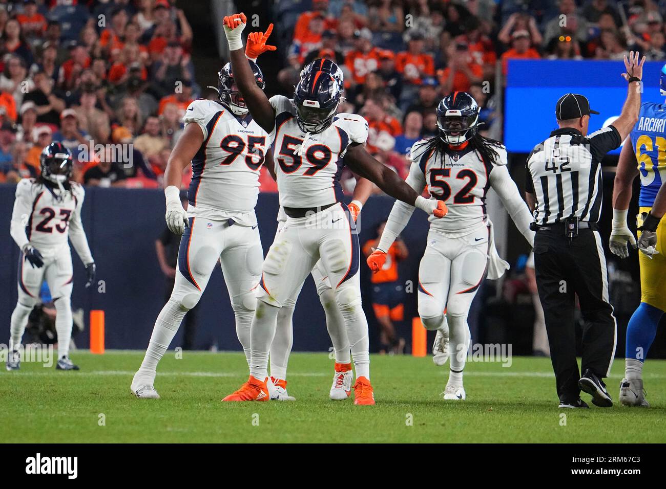Denver Broncos linebacker Thomas Incoom (59) celebrates a sack against ...