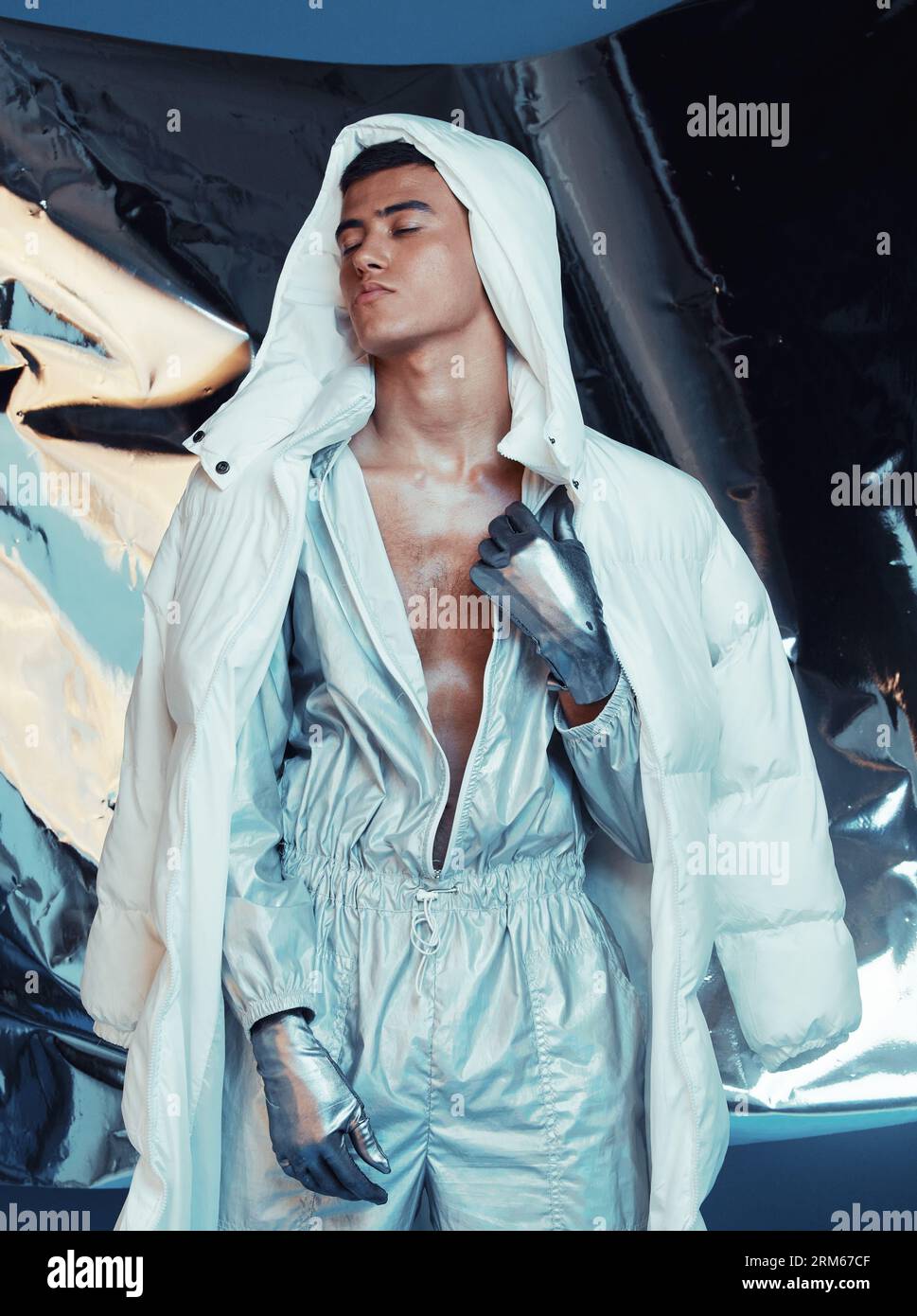 Fashion, future and cyberpunk with a model in a silver outfit for a ...