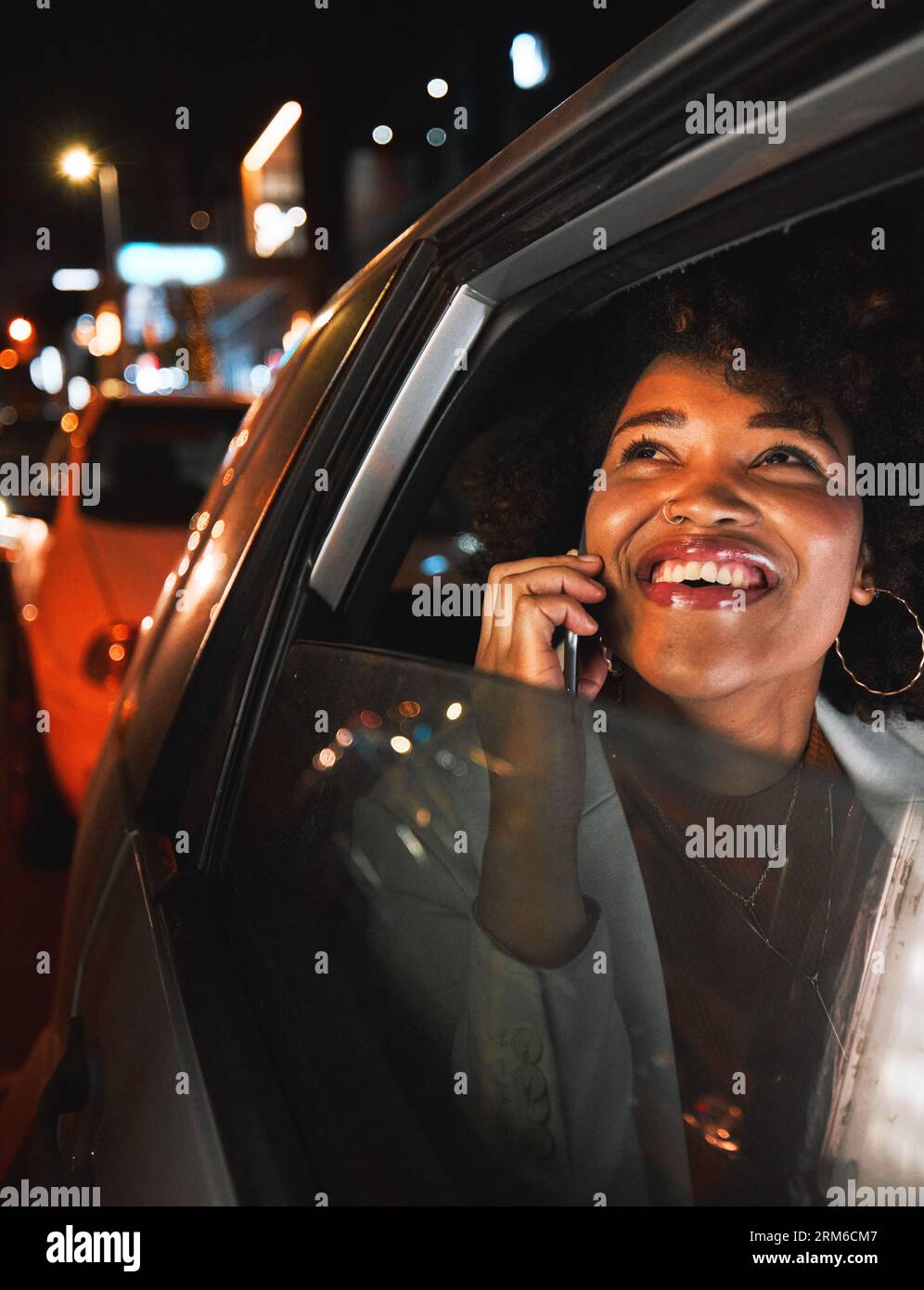 Black woman, phone call and travel at night in city taxi for ...