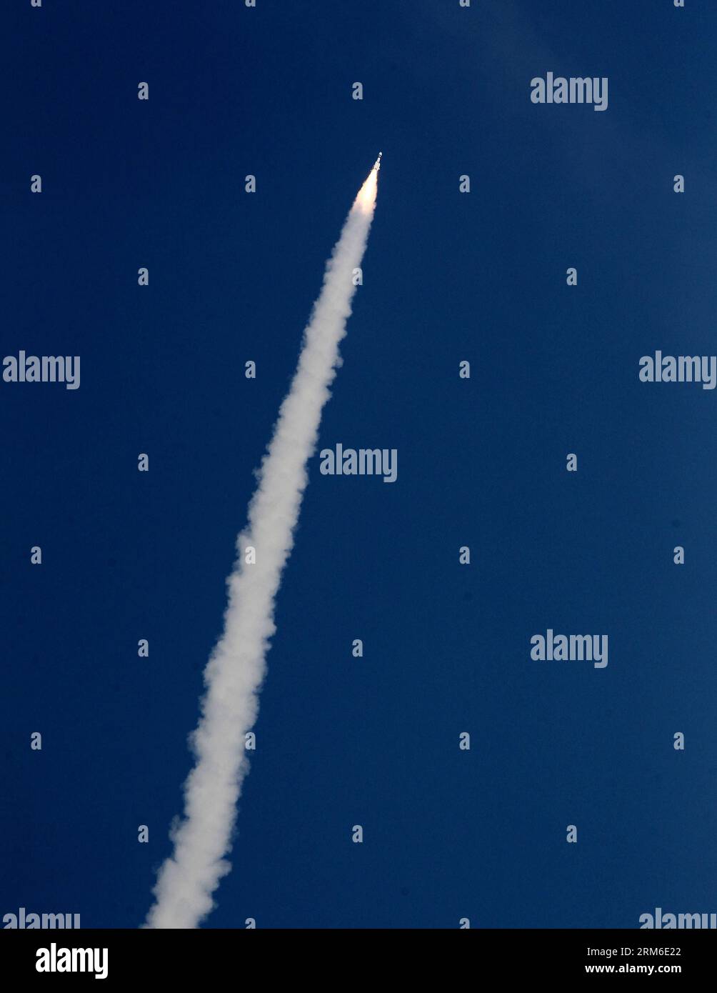 The white rocket blasts off from the Satish Dhawan Space Center in Sri ...
