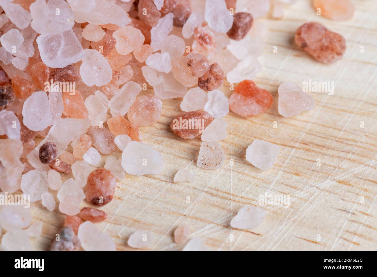 A large number of pink salt crystals of different sizes, a lot of pink ...
