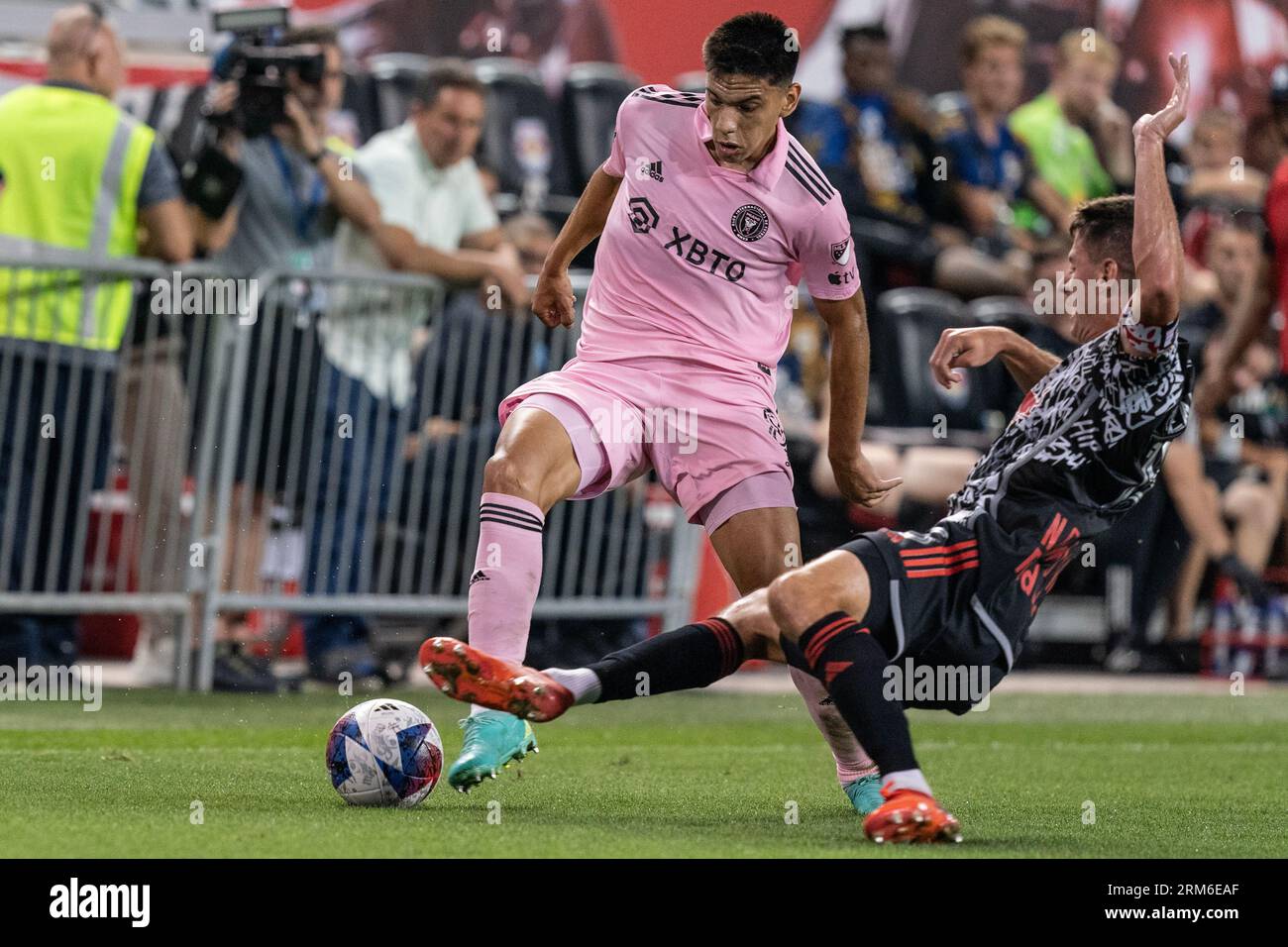 Sean Nealis (15) of Red Bulls and Diego Gomez (8) of Inter Miami fight ...