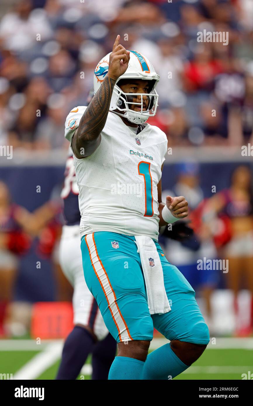 Miami Dolphins quarterback Tua Tagovailoa (1) reacts to a play during ...