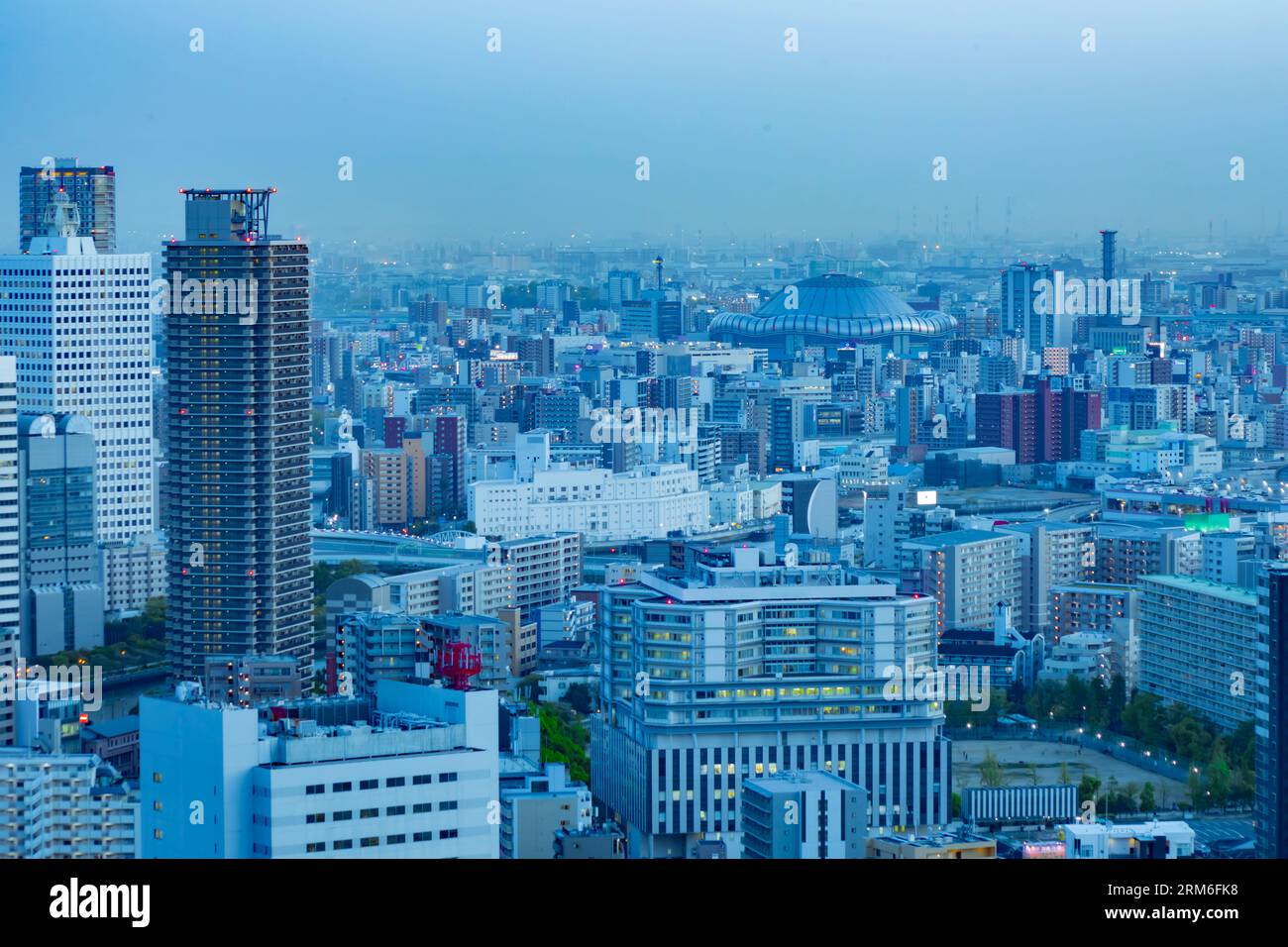 A dusk cityscape by high angle view near Kyocera dome in Osaka Stock ...