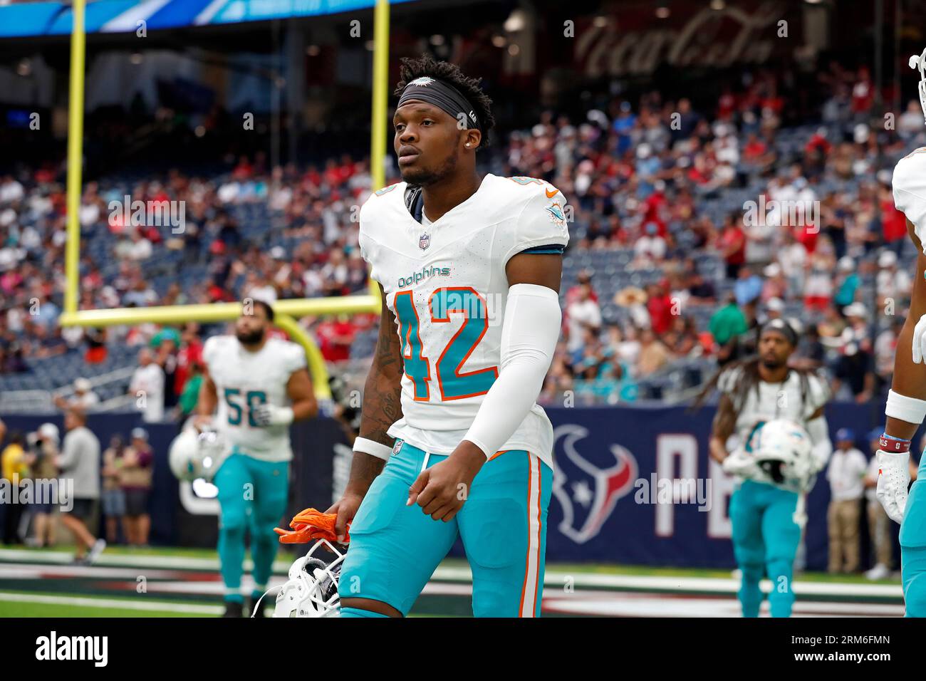 Miami Dolphins cornerback Bryce Thompson (42) warms up before an NFL ...
