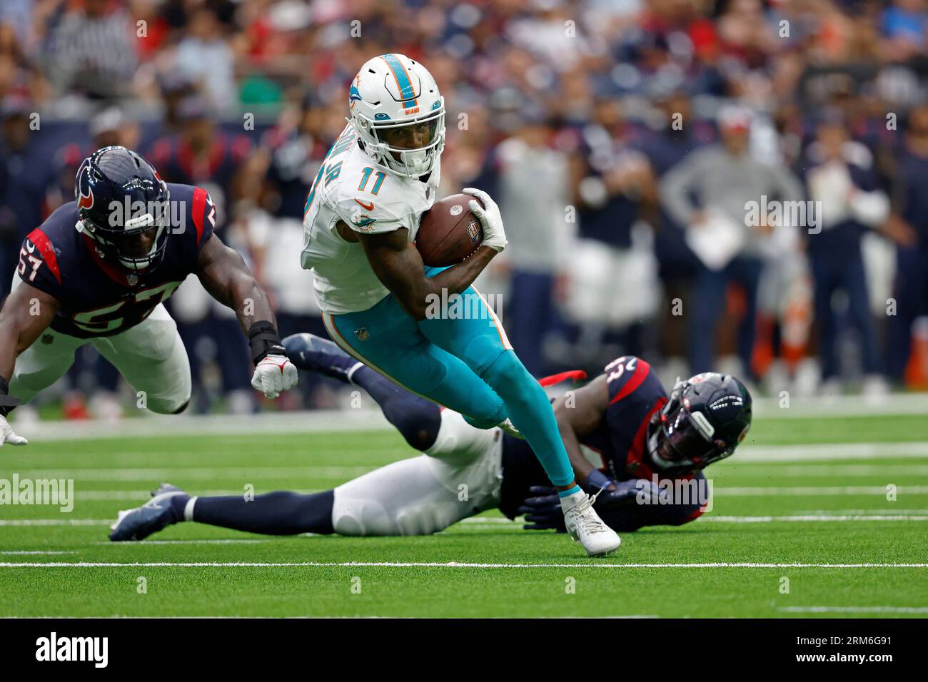 Miami Dolphins wide receiver Cedrick Wilson Jr. (11) spins around ...