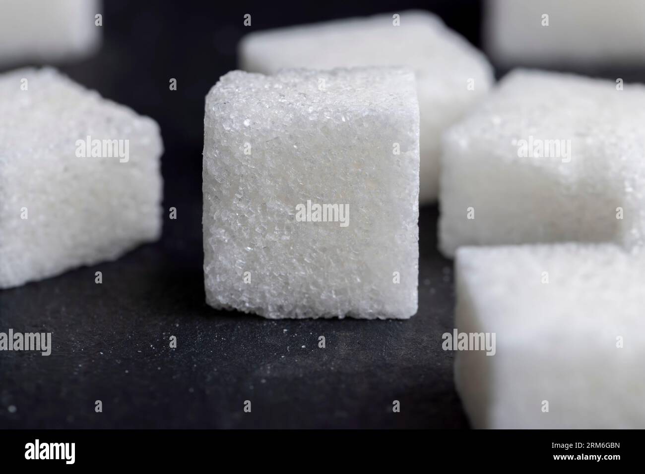 White sugar made from beetroot, cubes of white beet sugar close-up ...