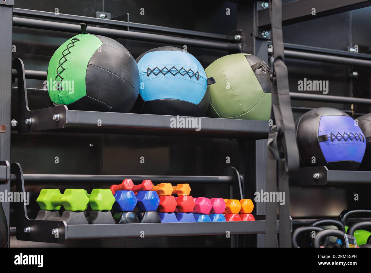 Colorful Fitness Medicine Balls and other Equipment inside Gym Stock ...