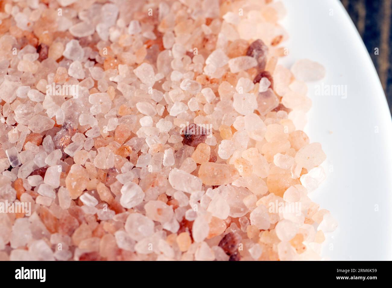 A large number of pink salt crystals of different sizes, a lot of pink ...