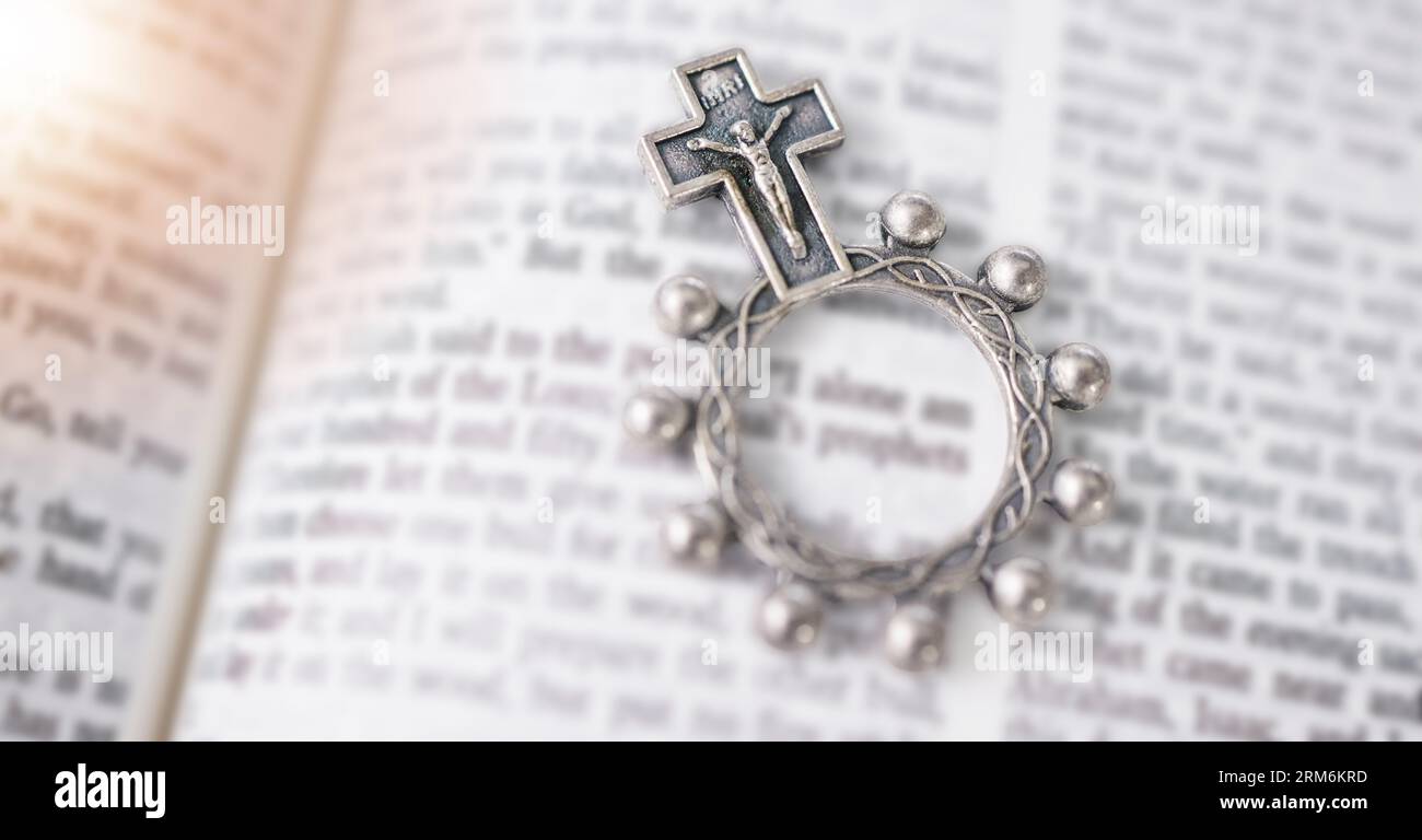 Cross, open book or bible study for worship, religion or mindfulness ...