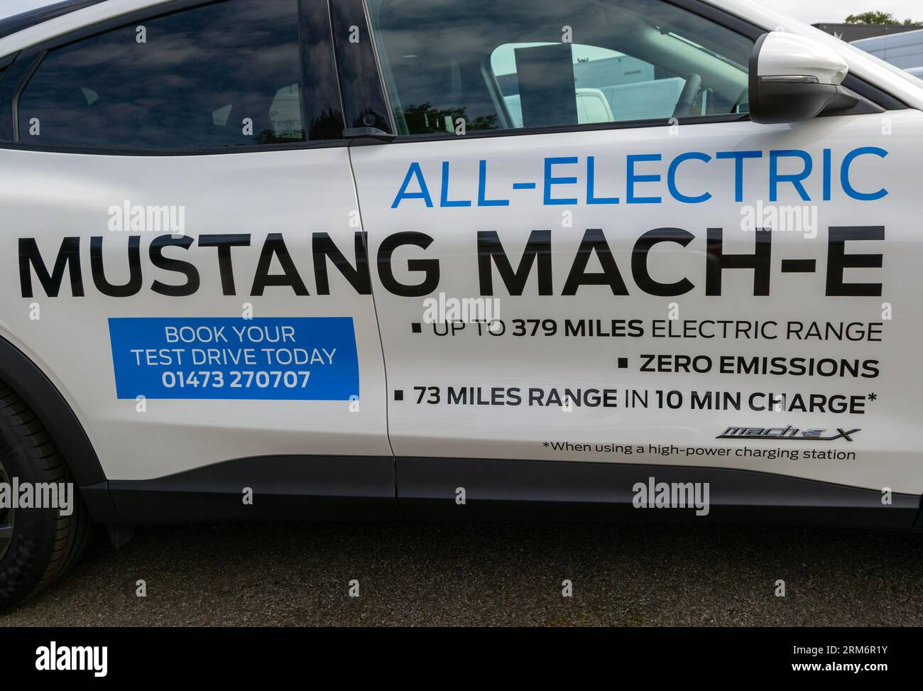 Electric car promotion Ford Mustang Mach-E, John Grose car dealership ...