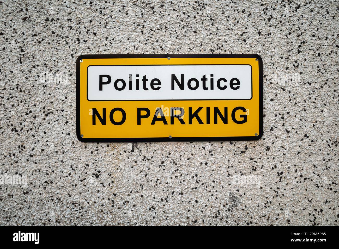 Polite notice, No parking sign in the UK Stock Photo - Alamy