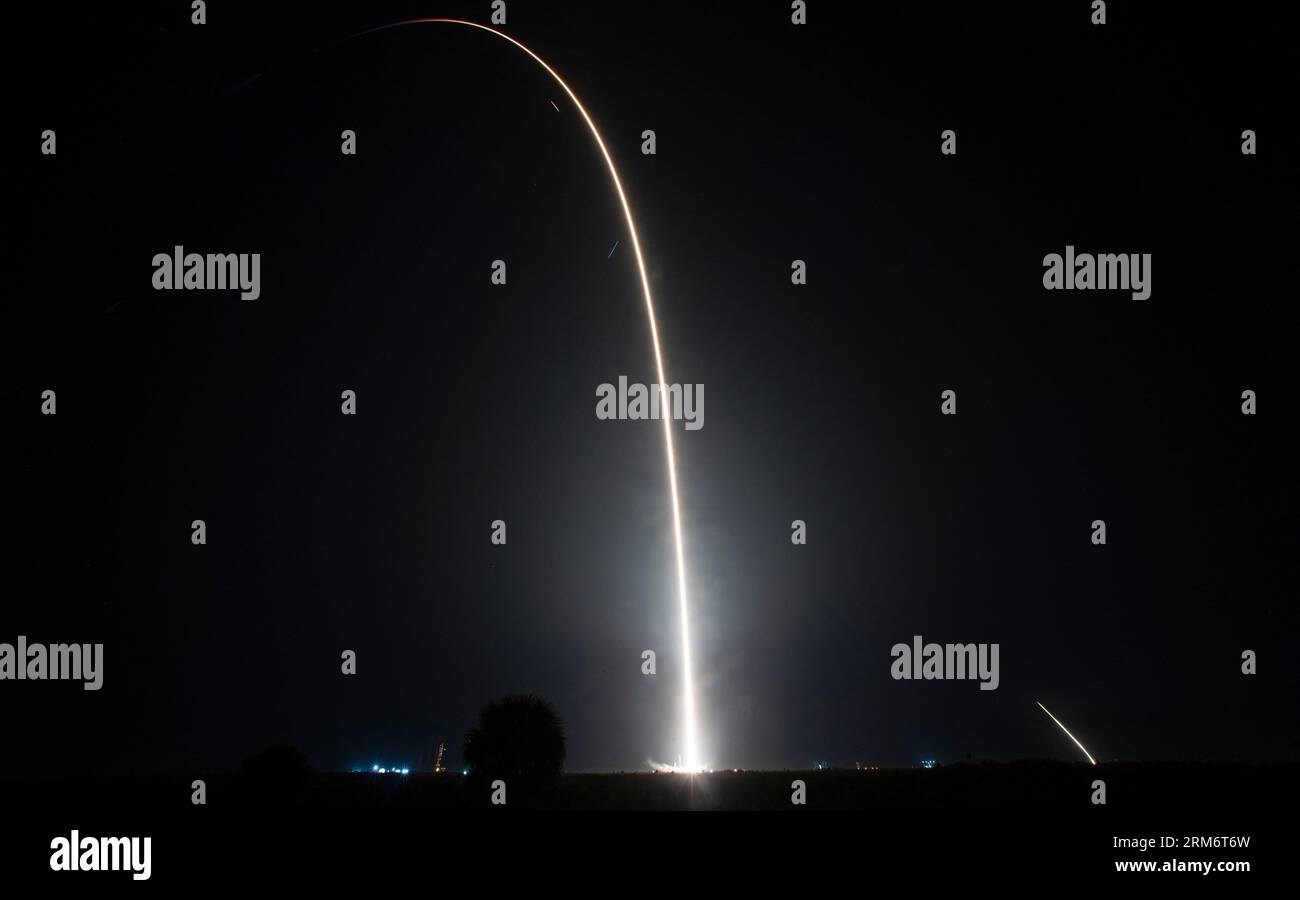 In this eight-minute long exposure, a SpaceX Falcon 9 rocket carrying ...