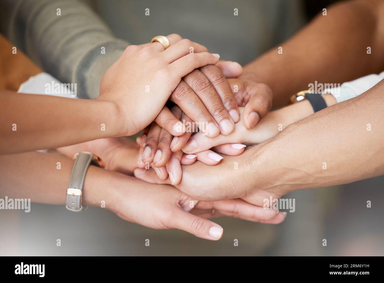 Office, teamwork and hands in huddle together for team building ...