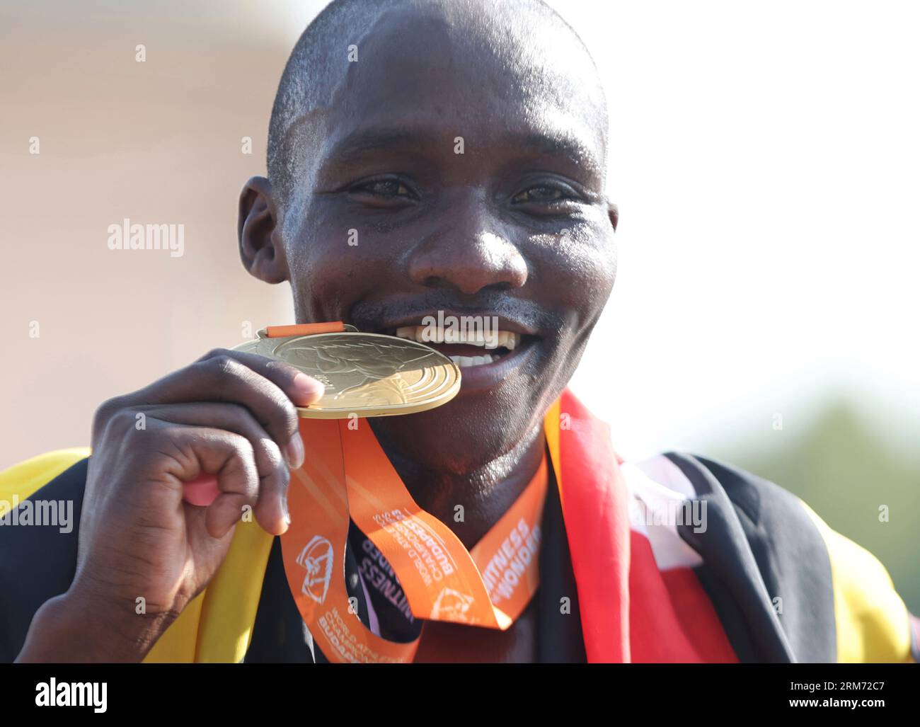 Victor Kiplangat of Uganda celebrates after winning the men's marathon ...