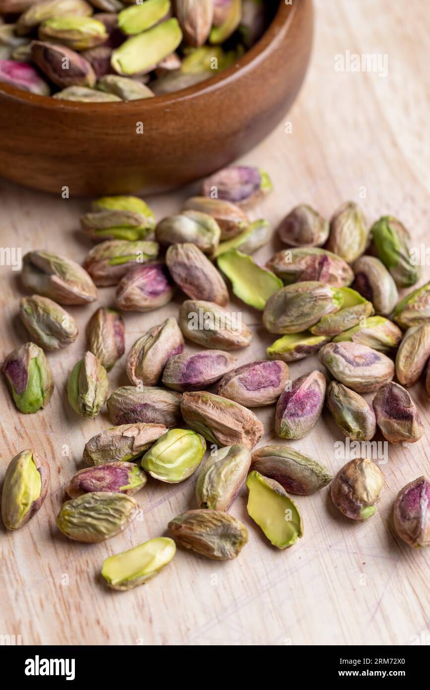 Crispy delicious pistachios with salt without shell, peeled and striped ...