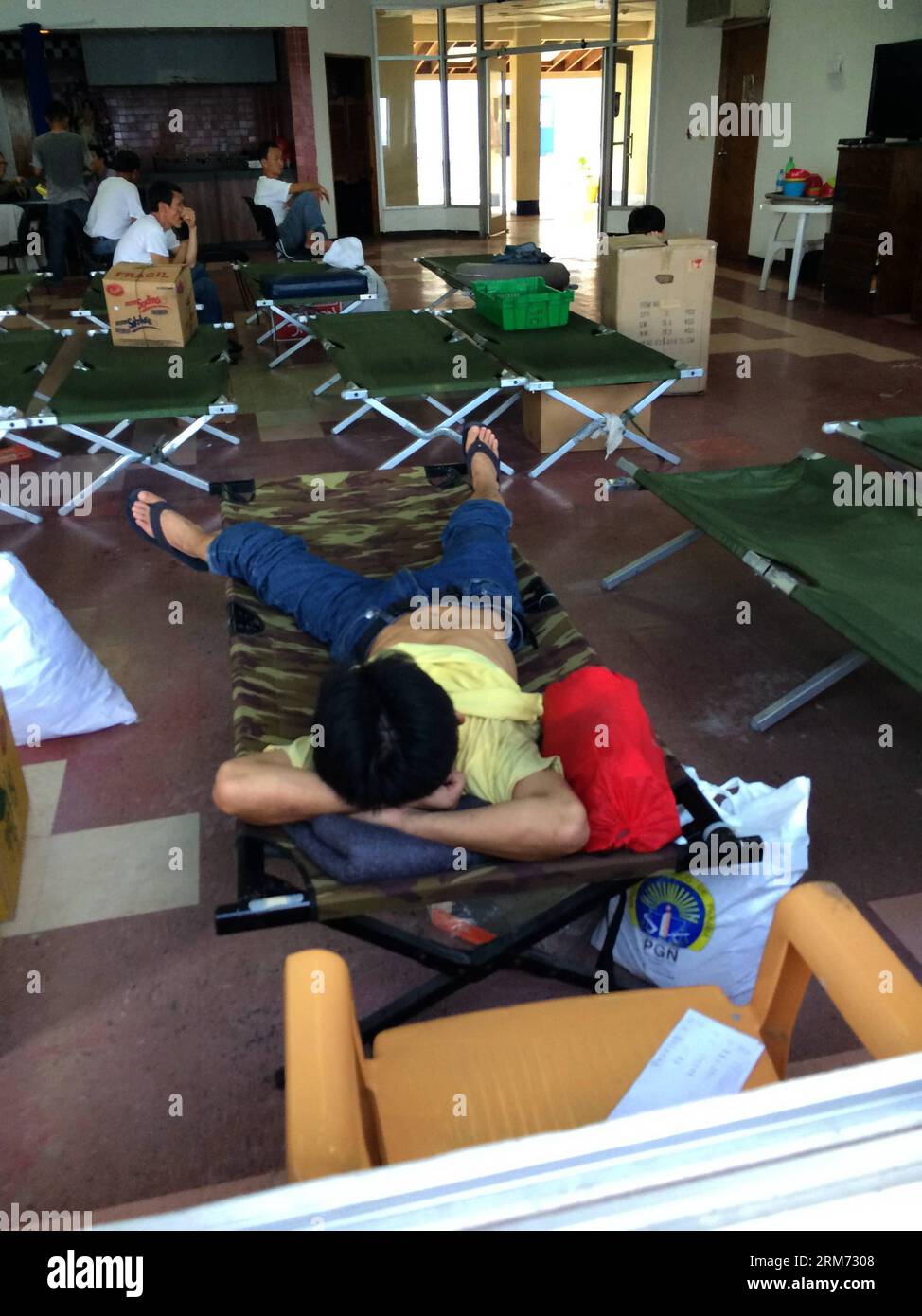 COLON, (Xinhua) -- Photo taken with a cellphone shows crew members of ...