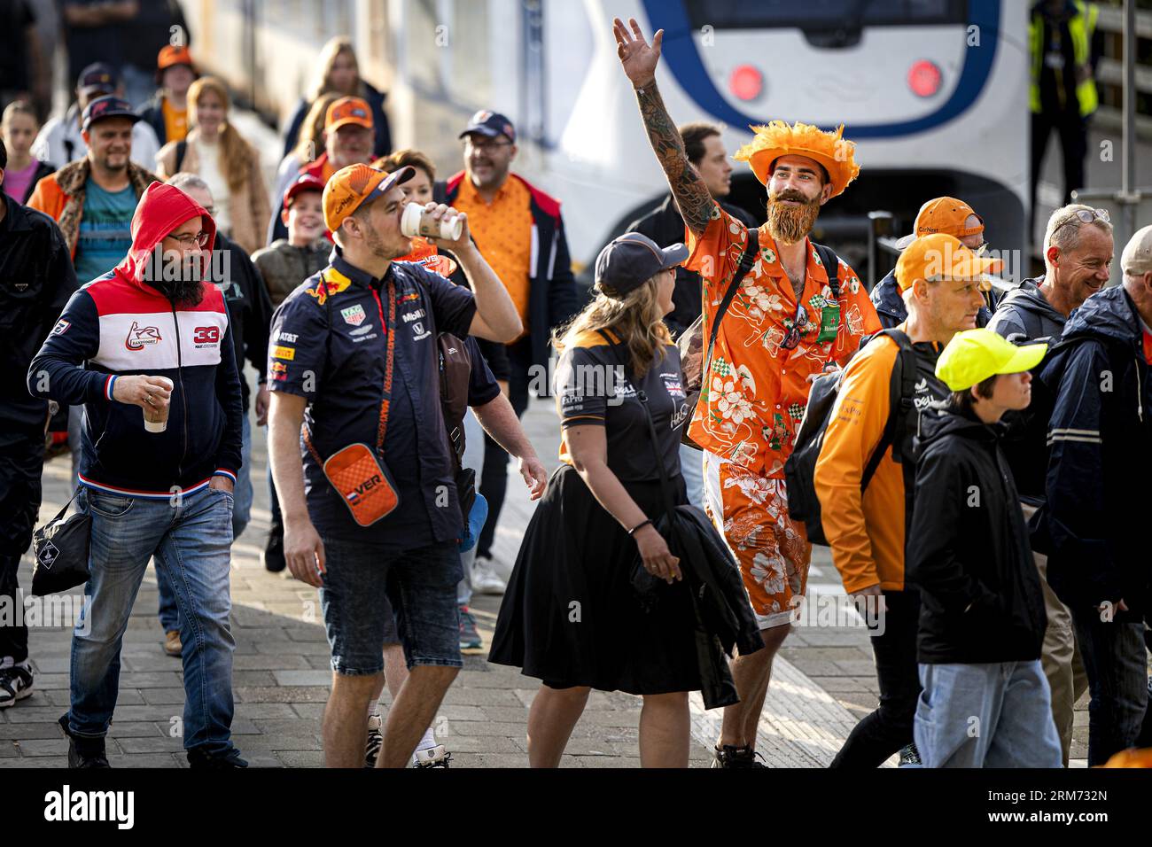 ZANDVOORT - Fans arrive at Zandvoort station for race day of the F1 ...