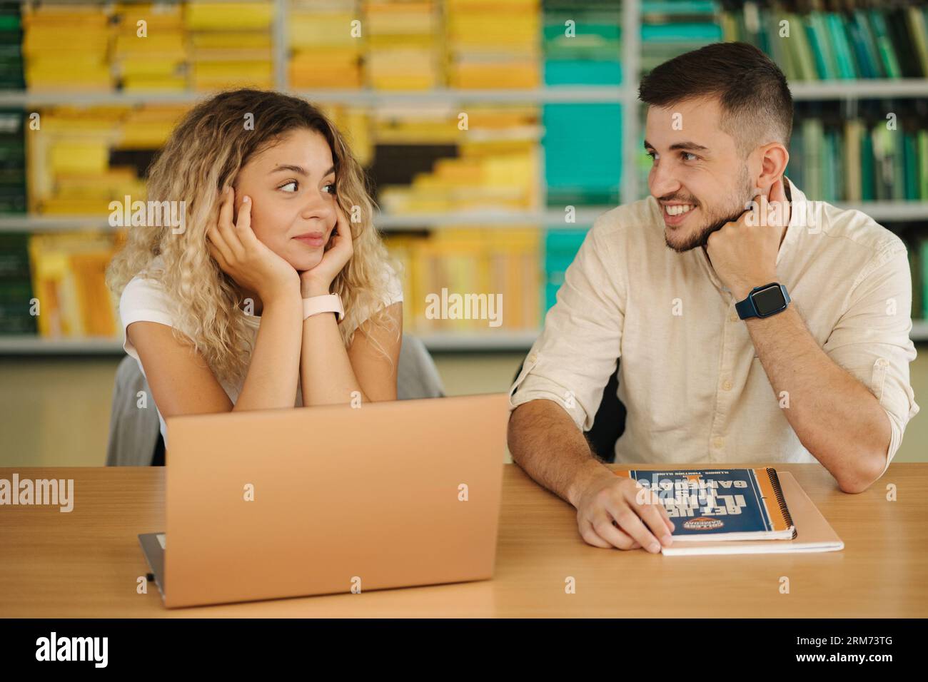 Pretty girl student look into laptop and don't know how to complete the ...