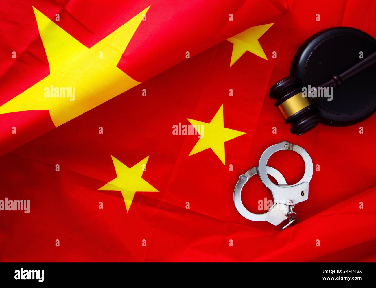 Justice and court concept of China. Judge hammer on a flag background ...