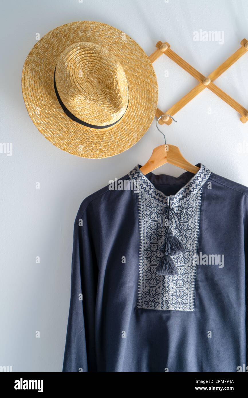 Ukrainian clothes embroidered man shirt. Blue gray and black threads ...