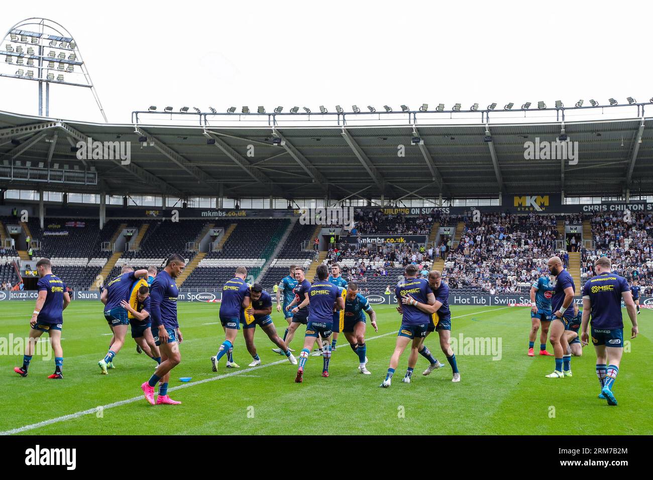 The Warrington wolves team warm up ahead of the Betfred Super League ...