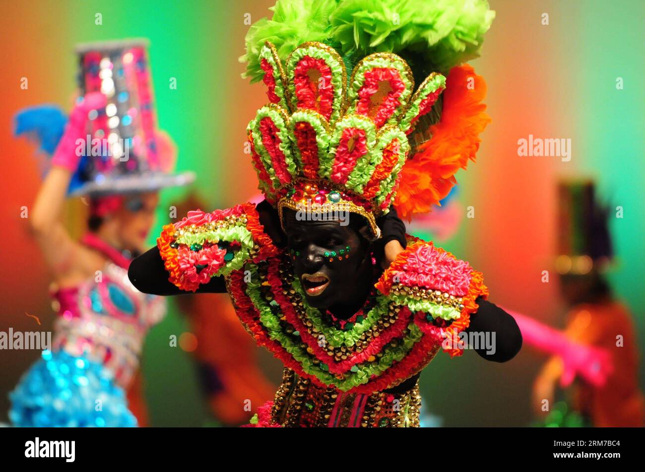 A dancer performs during the Carnival Gala 2014, at the Cibao Great ...