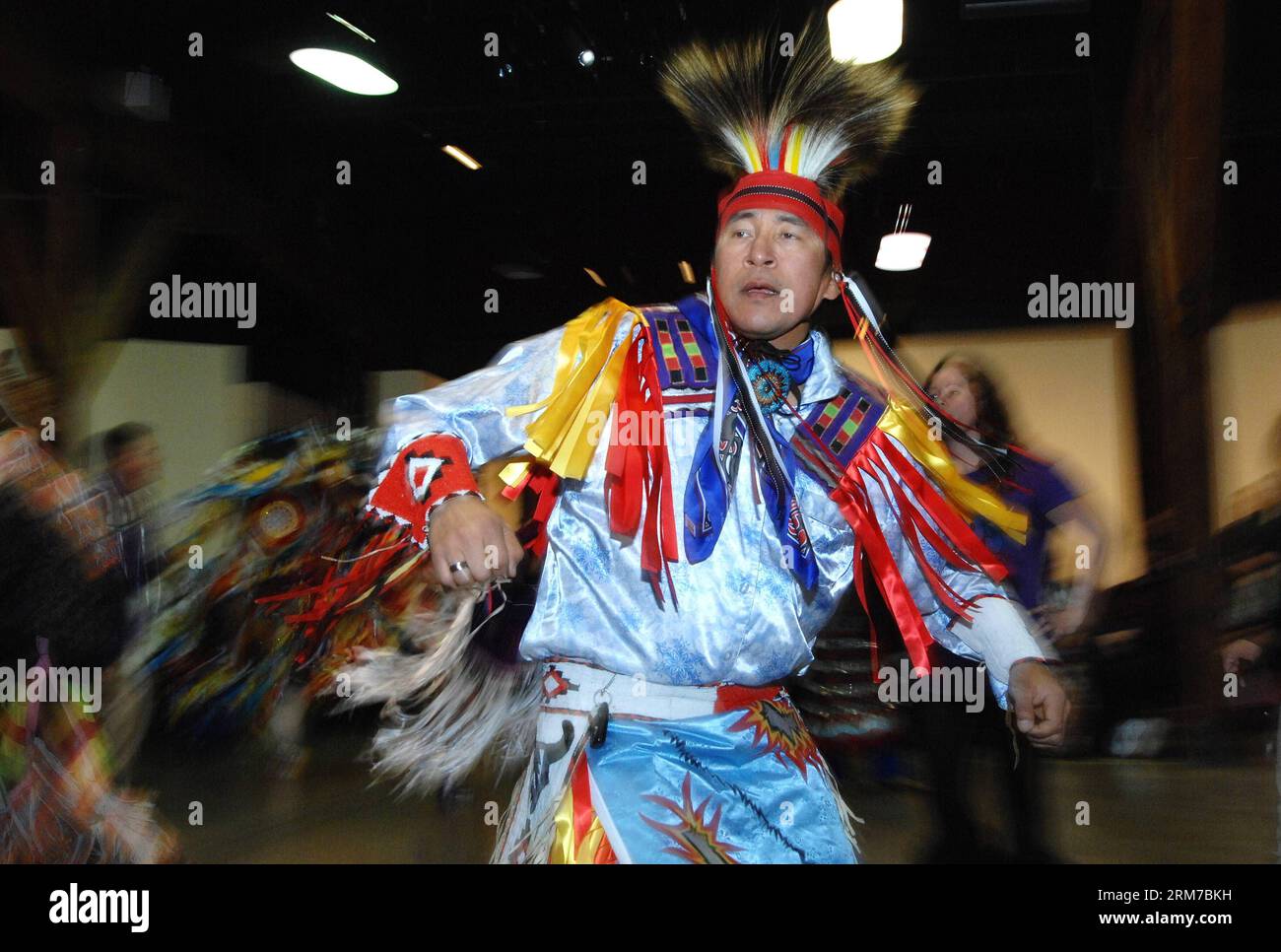 An aboriginal man dances at the Native Indian Pow Wow as part of the ...