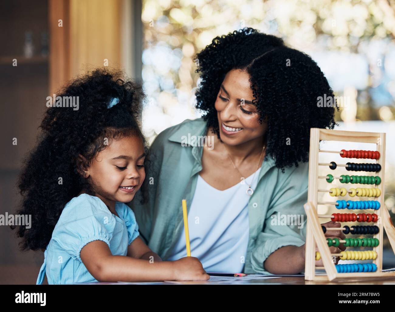 Happy family, education and mother helping child with kindergarten ...