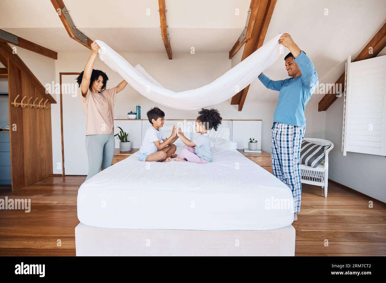 Kids waking up parents hi-res stock photography and images - Alamy
