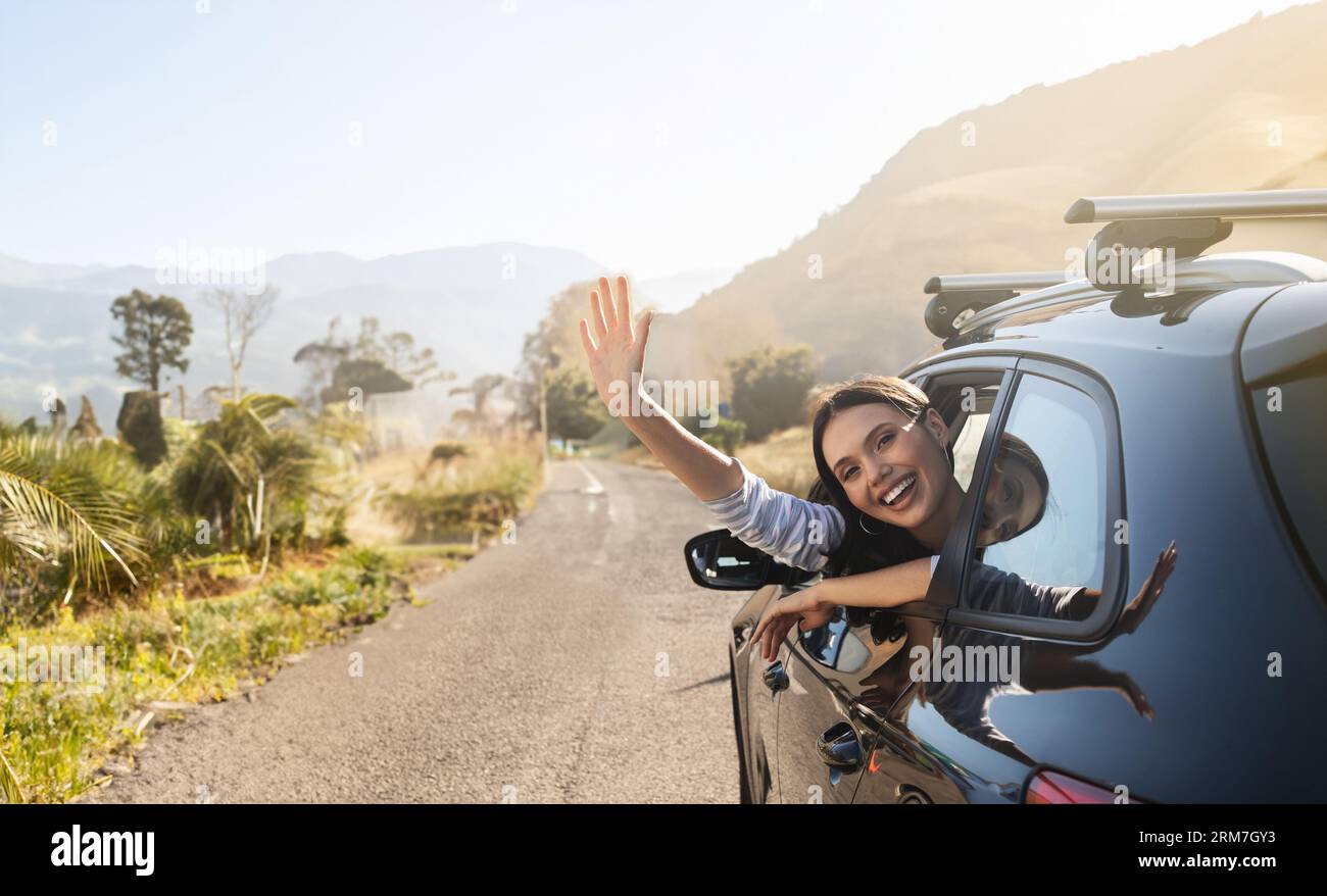 Family waving from window hi-res stock photography and images - Alamy